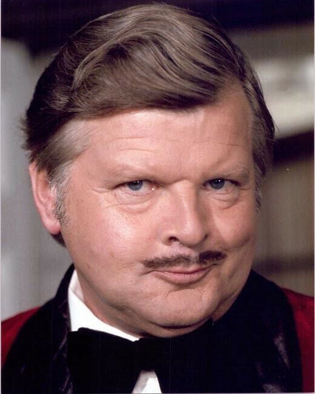 Benny Hill gives a cheeky smile as his characters Benny Hill Show ...