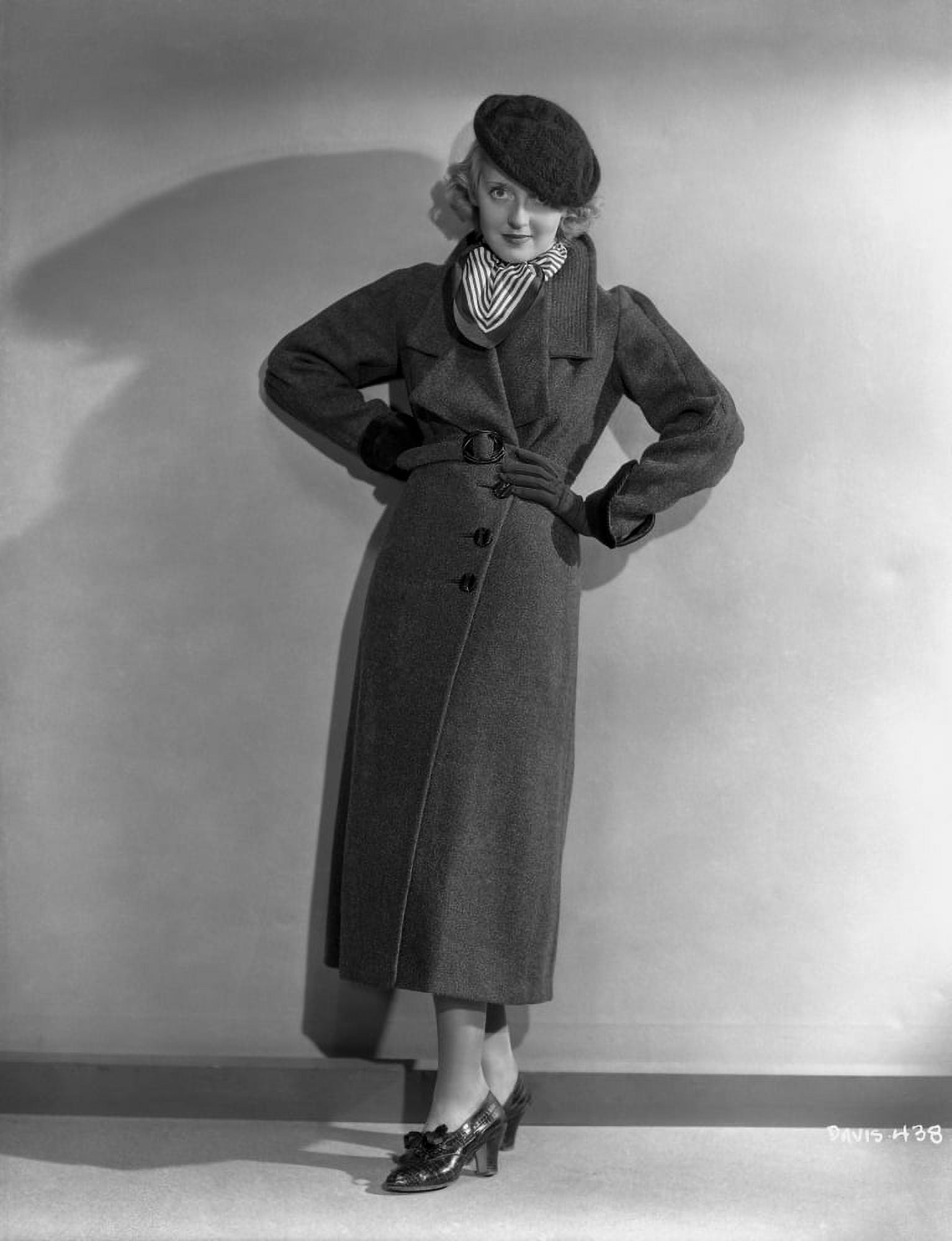 Bette Davis Posed with Hands on the Back in Black Wool Cap and Trench ...