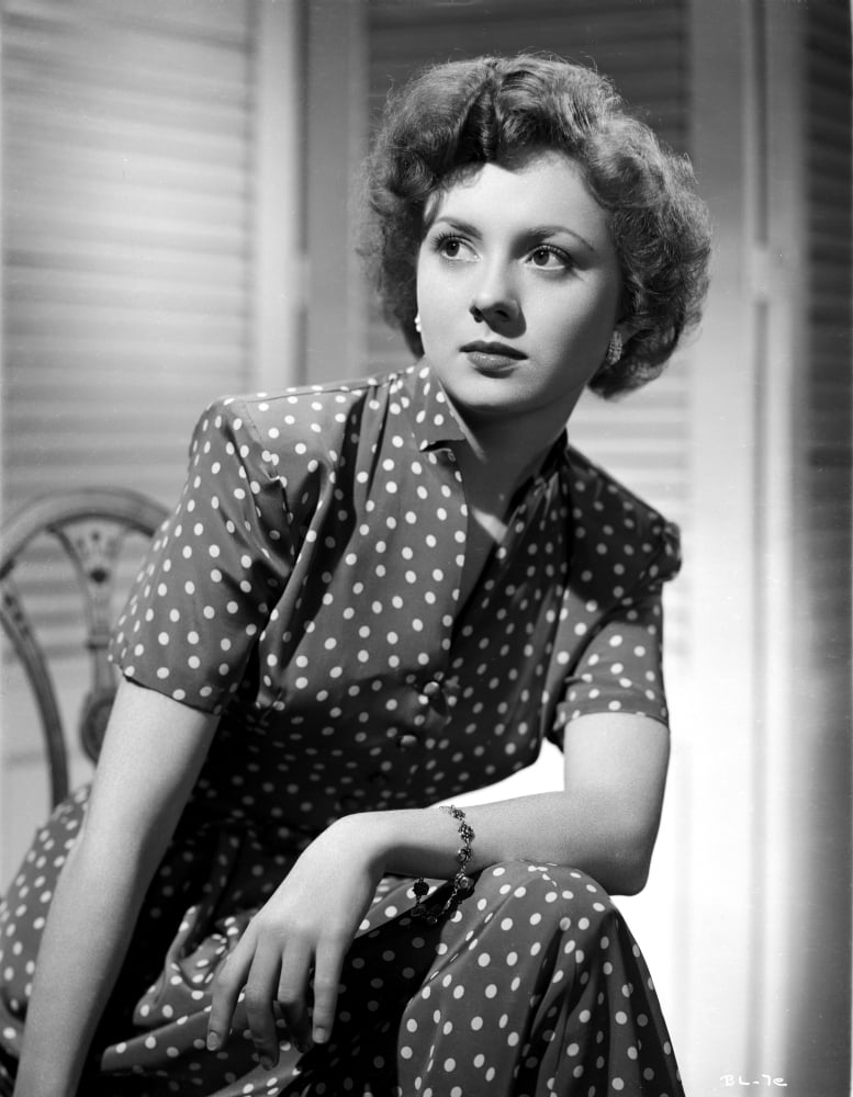 Betty Lynn Seated with Left Arm Rested on the Lap with Legs Crossed in ...