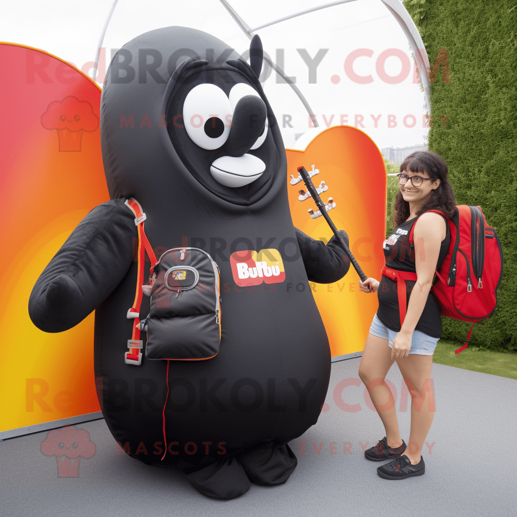 Black Currywurst REDBROKOLY mascot costume character dressed with a ...