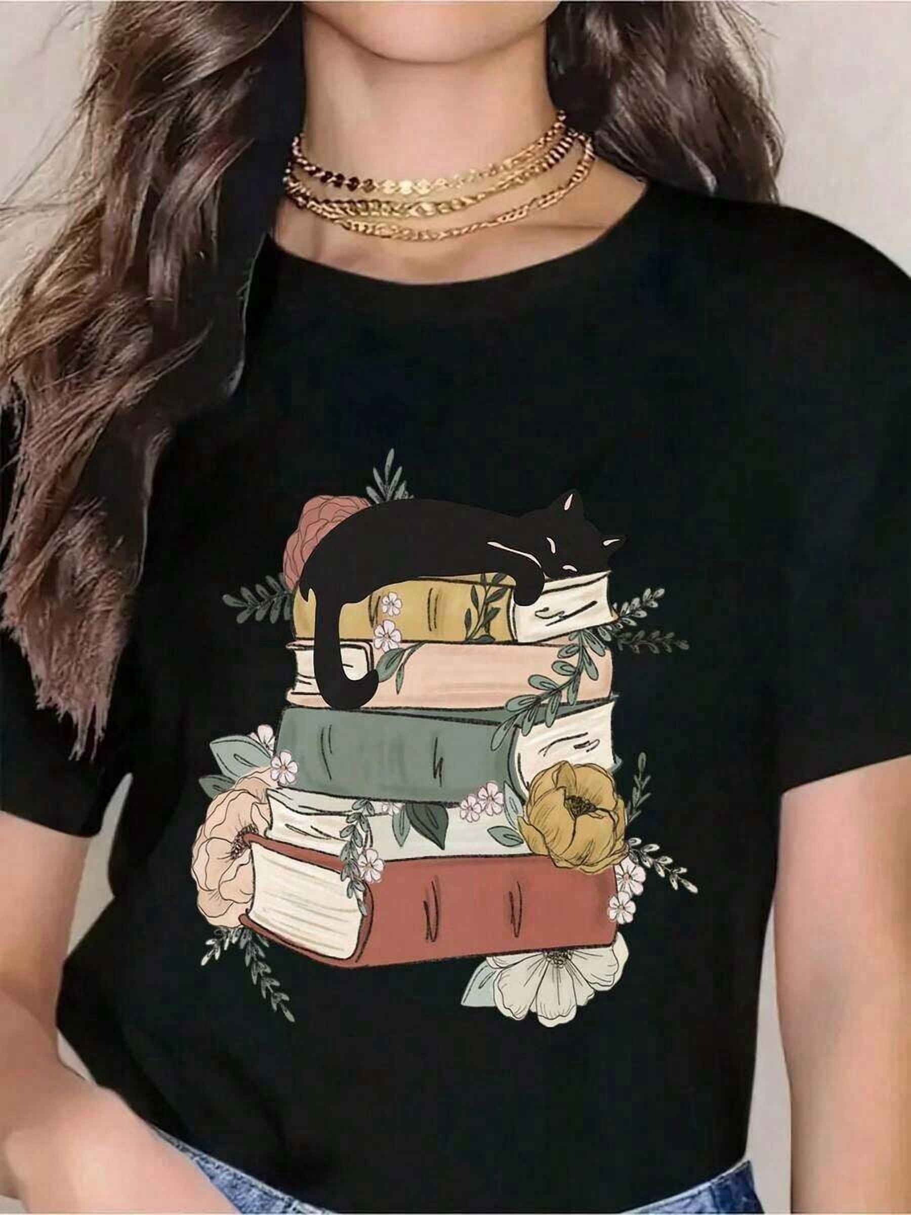 Black Graphic T-Shirt Featuring Sleeping Cat On Floral Book Stack For ...