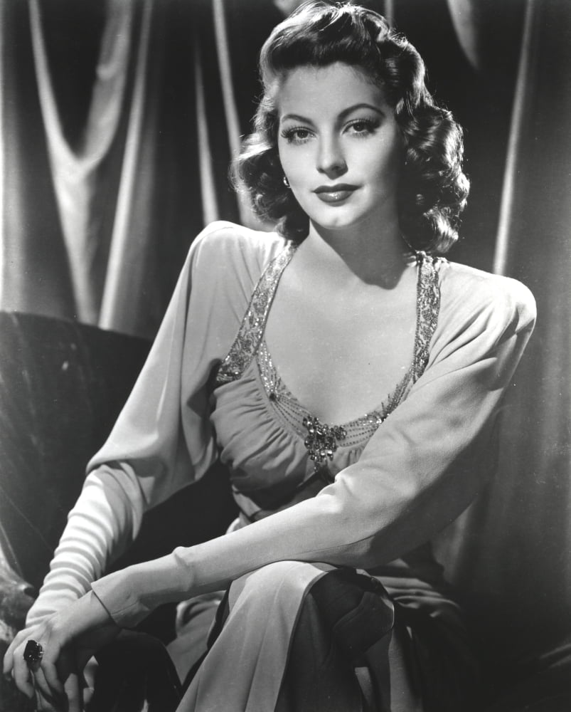 Black and White Portrait of Ava Gardner sitting in Long Dress Photo ...