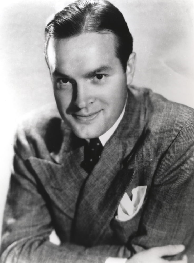 Bob Hope smiling wearing Formal Suit Portrait with White Background ...