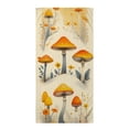 Boho beach towel A group of orange and white mushrooms in a field of ...