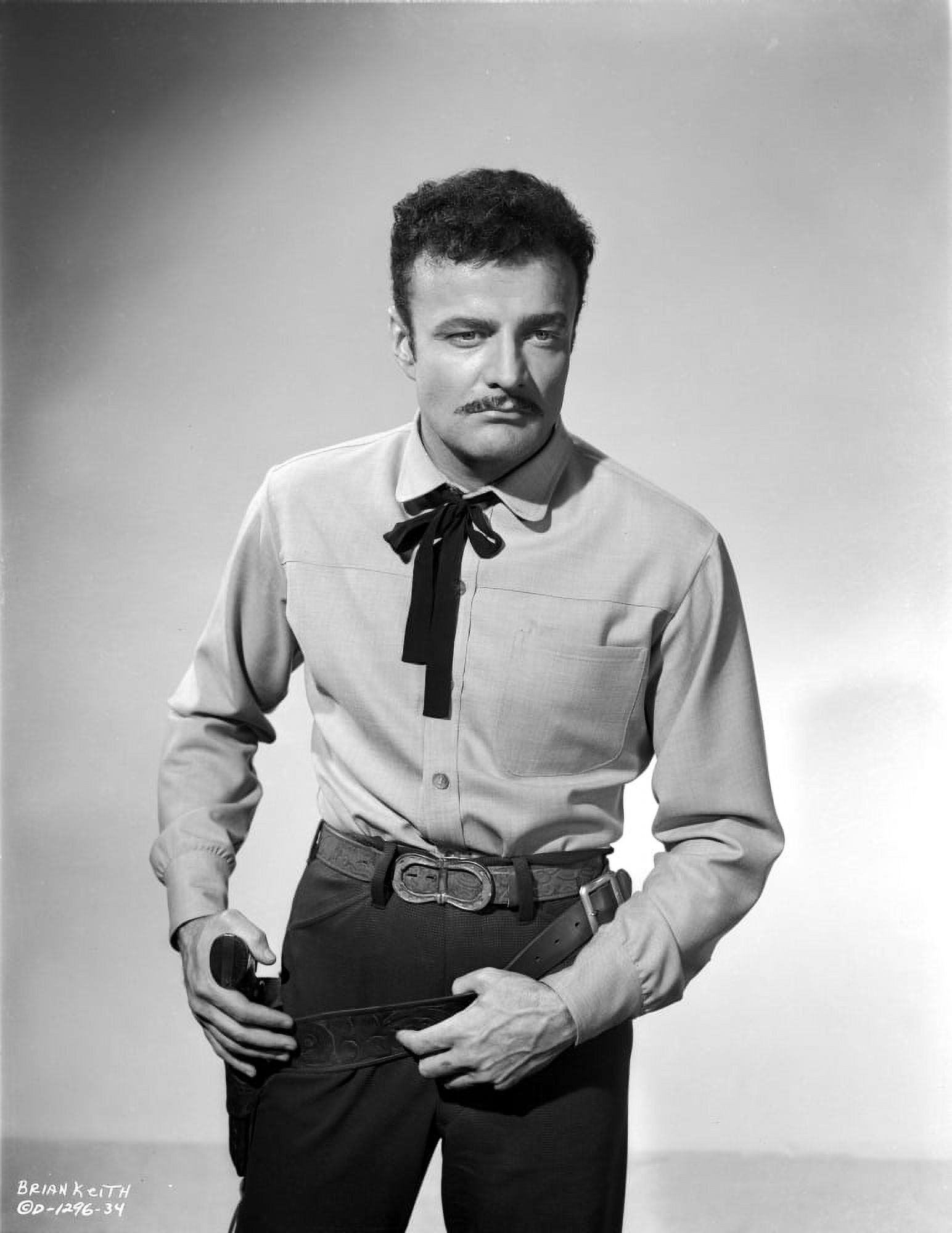 Brian Keith wearing a neck ribbon and a holster Photo Print (24 x 30 ...
