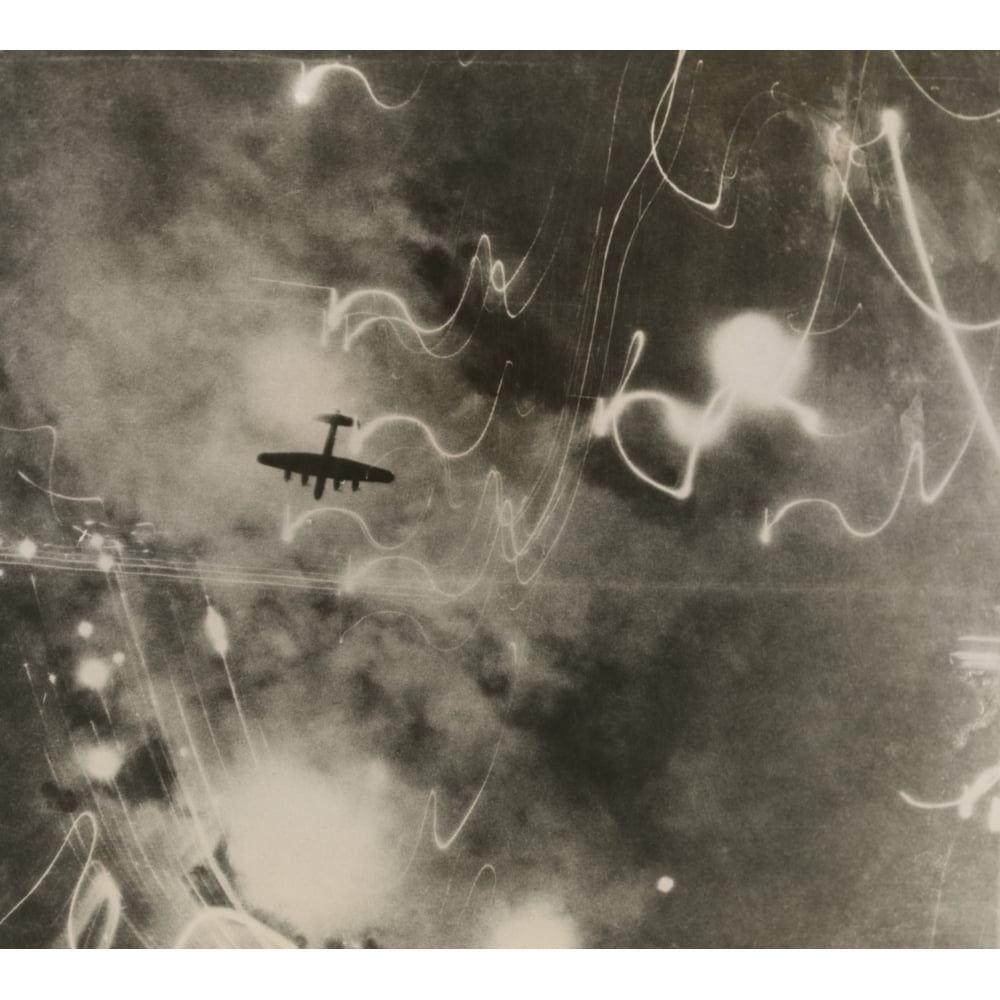British Raf Bomber And Trails Of Light From Incendiary Bombs. Photo ...