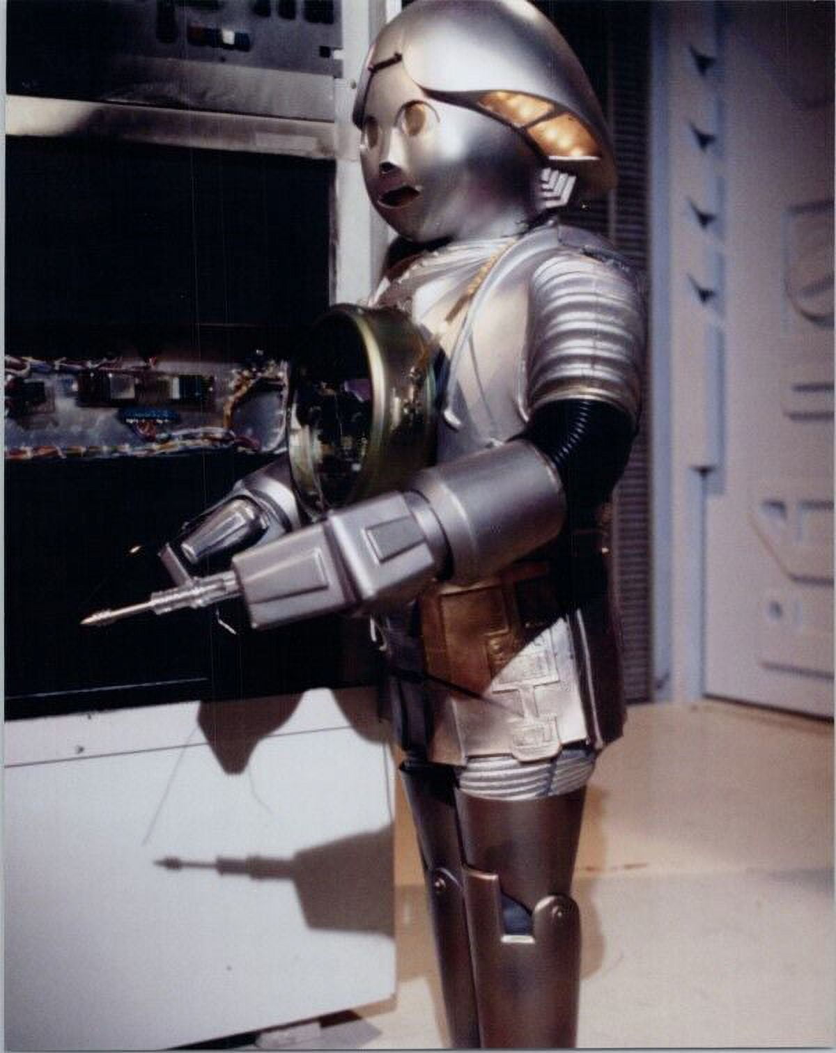 Buck Rogers in the 25th Century Twiki the ambuquad stands in space ship ...