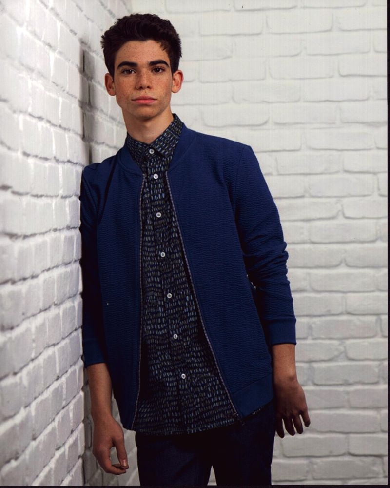 Cameron Boyce Leaning On White Wall Photo Print (8 x 10) - Item ...