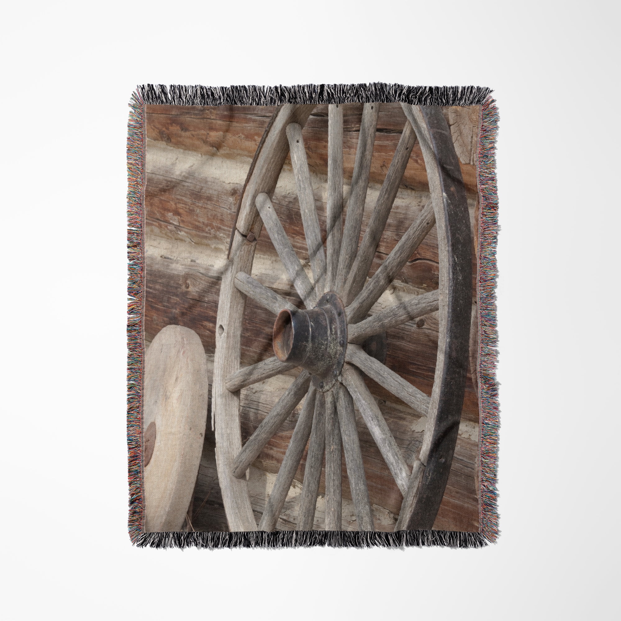 Canada, Fort Steele. Wagon Wheel, Grinding Stone, And Log Cabin ...