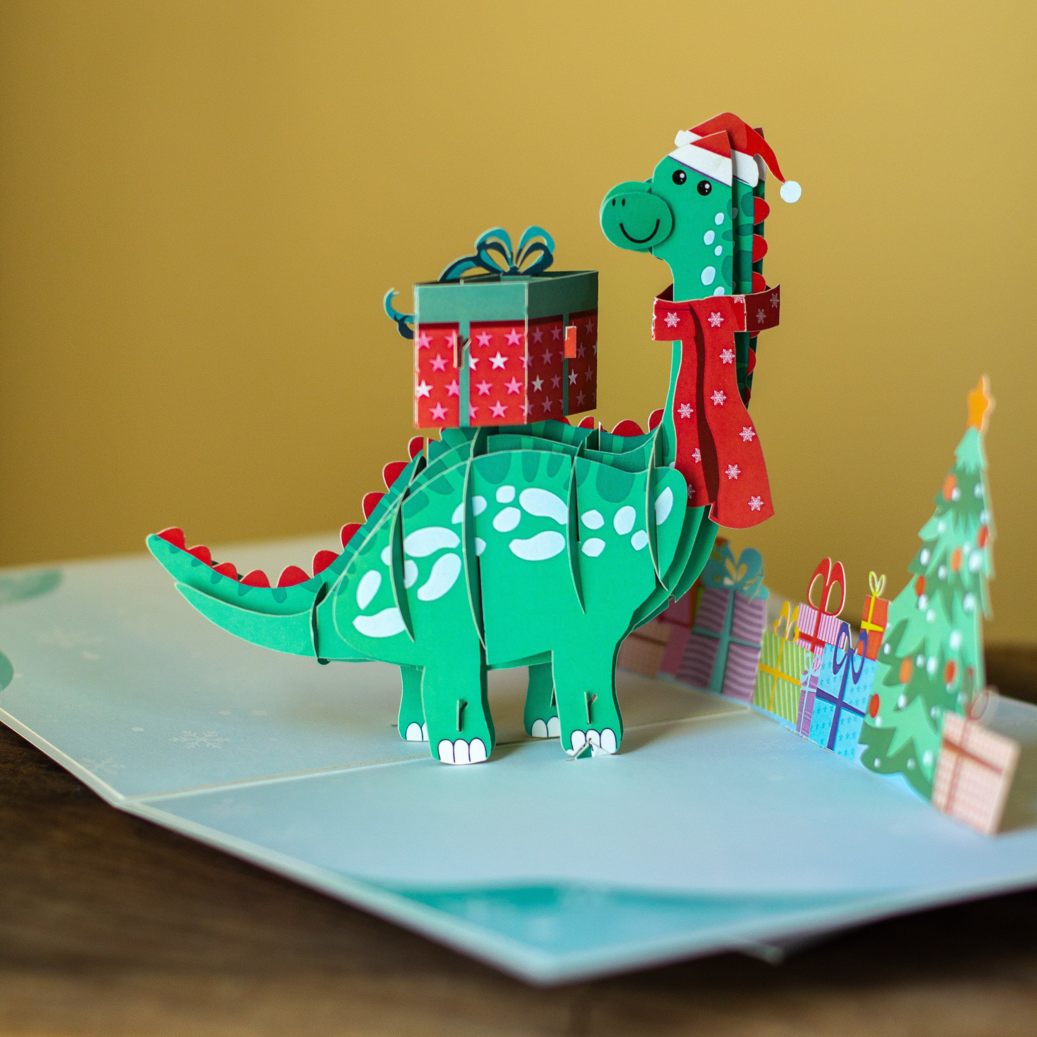 Cardstalked Pop-Up Dinosaur Christmas Card, Help spread holiday cheer ...
