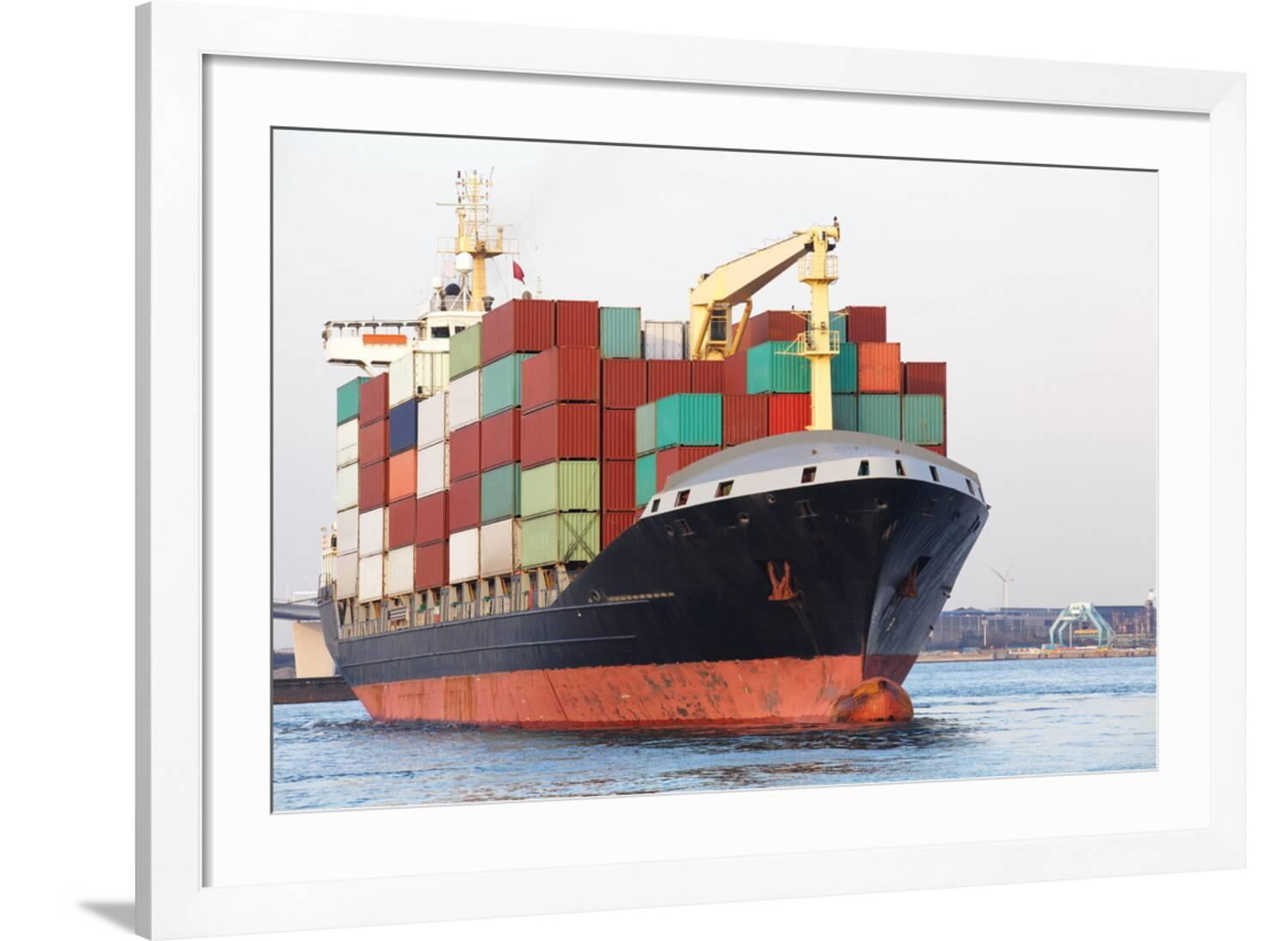 Cargo Freight Ship with Stacked Container at Harbor Terminal Framed ...