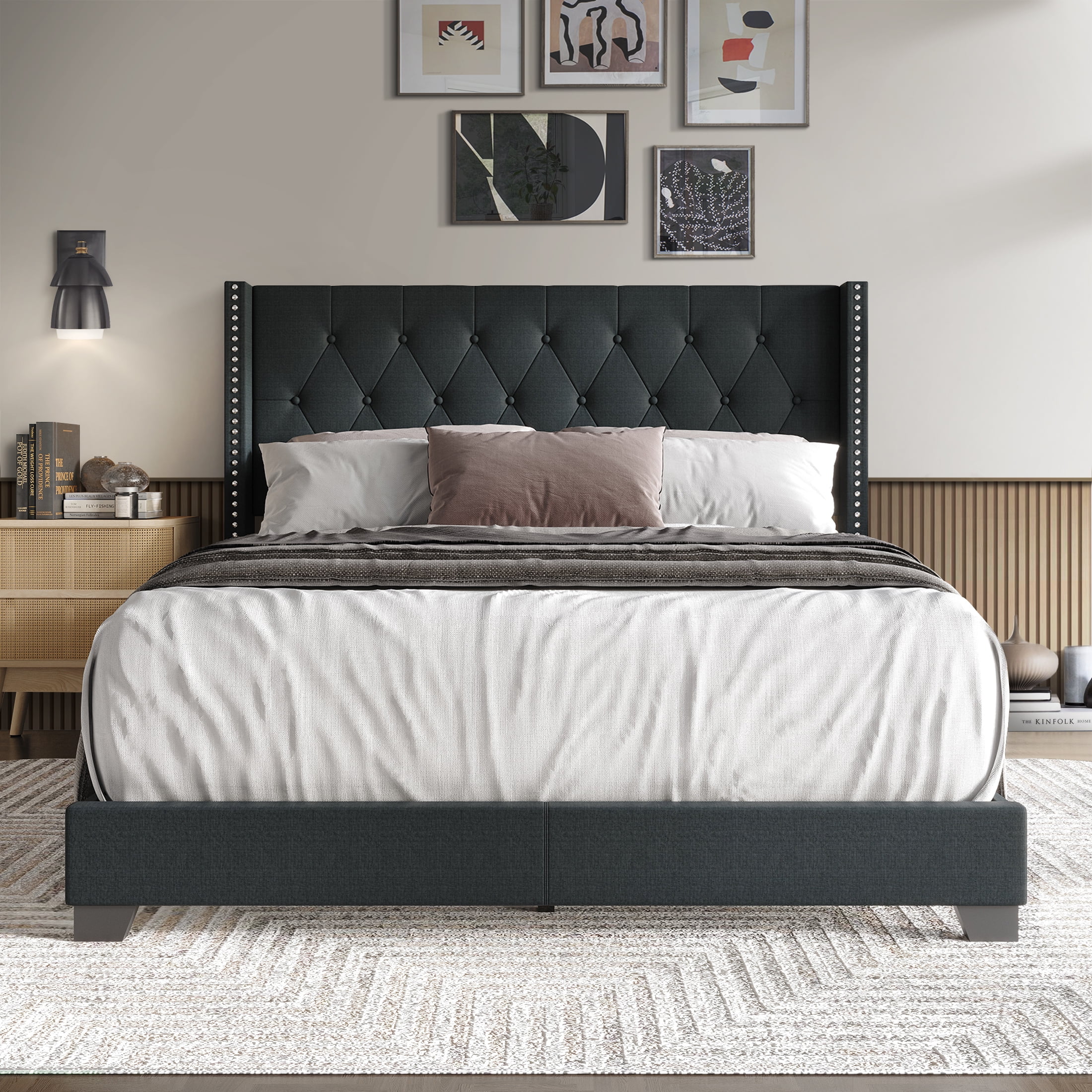 Grey upholstered bed with nailhead trim store