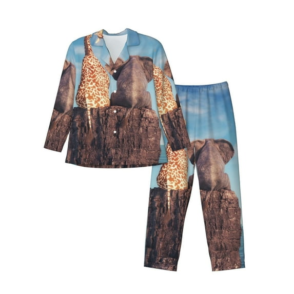 Cauagu Elephant And A Giraffe Sitting On A Rock Admiring The Ocean ...