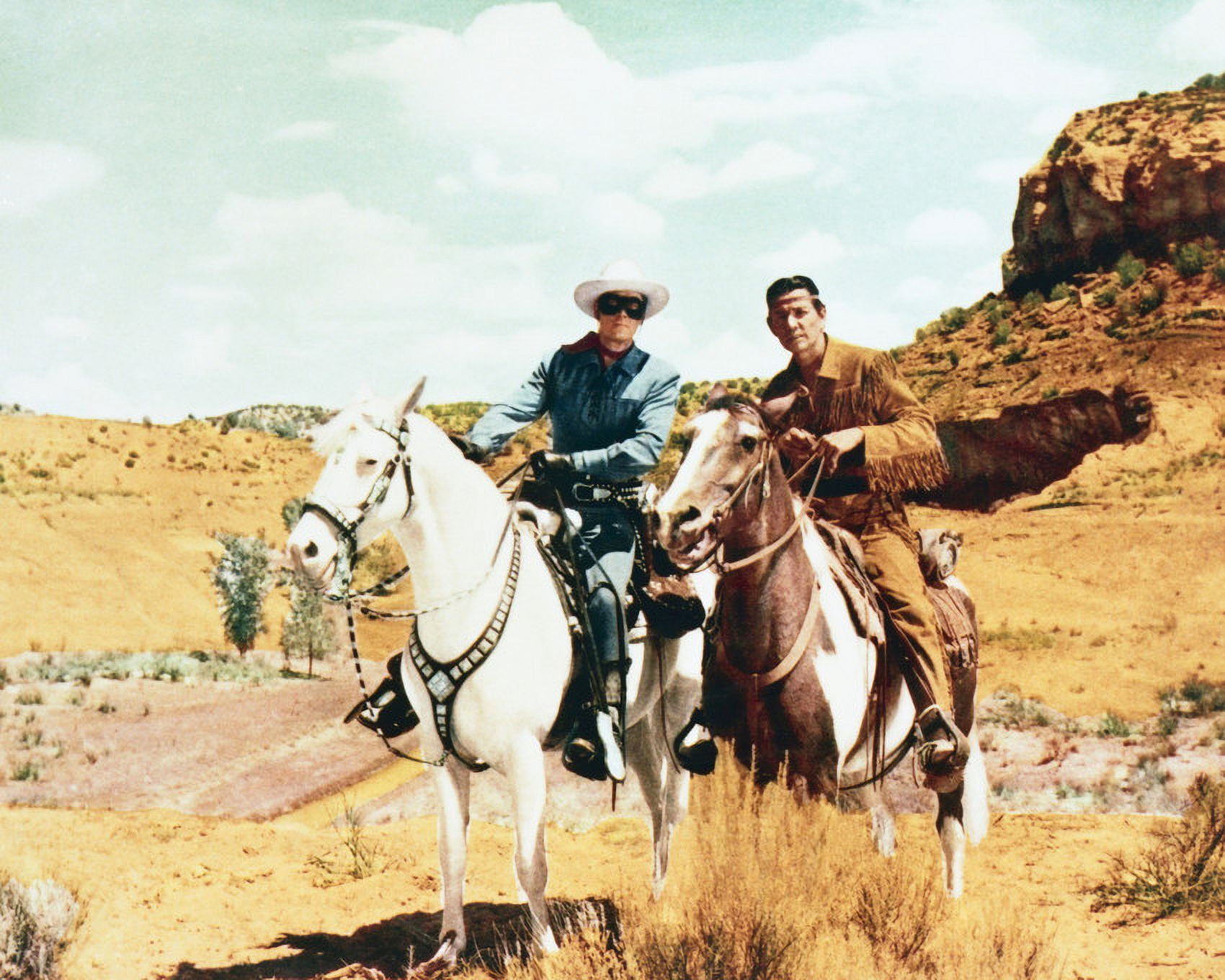 Clayton Moore And Jay Silverheels In The Lone Ranger Riding Together ...