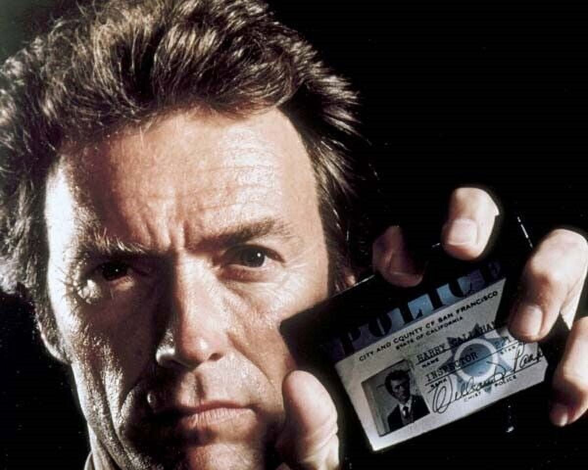 Clint Eastwood shows his Harry Callaghan police badge The Enforcer 8x10 ...