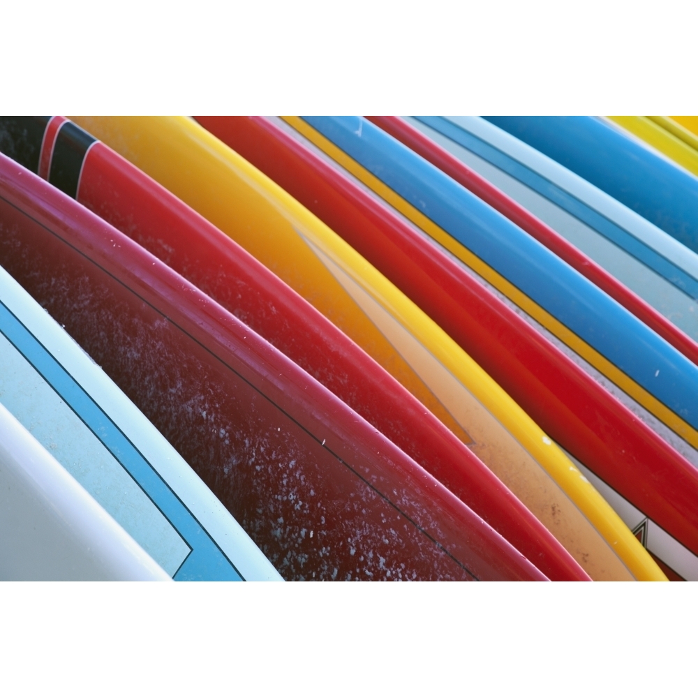 Close up of coloured surfboards lined up; Honolulu Oahu Hawaii United ...