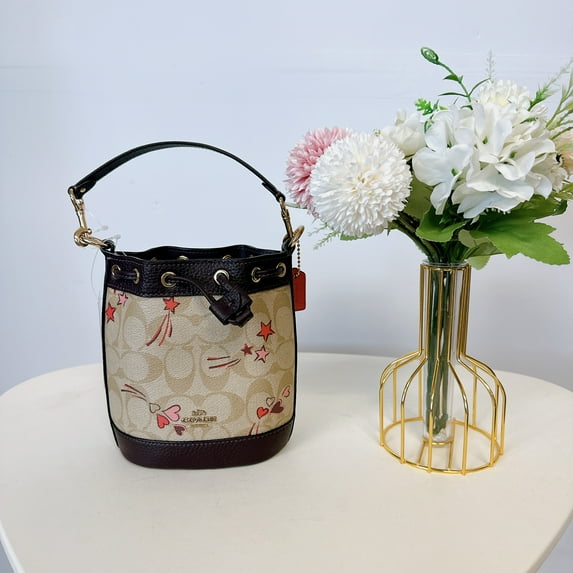 Coach Mini Dempsey Bucket Bag In Signature Canvas With Heart And Star ...