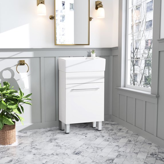 Compact white vanity - Overflow hole to prevent leaks - Small bathroom ...