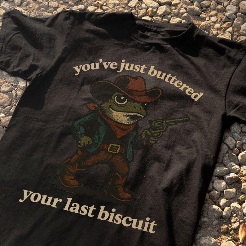 Cowboy Frog “Buttered Your Last Biscuit” – Quirky Western Frog Graphic ...