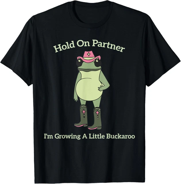 DOPASHIRT Hold On Partner I'M Growing A Little Buckaroo Cow Frog T ...