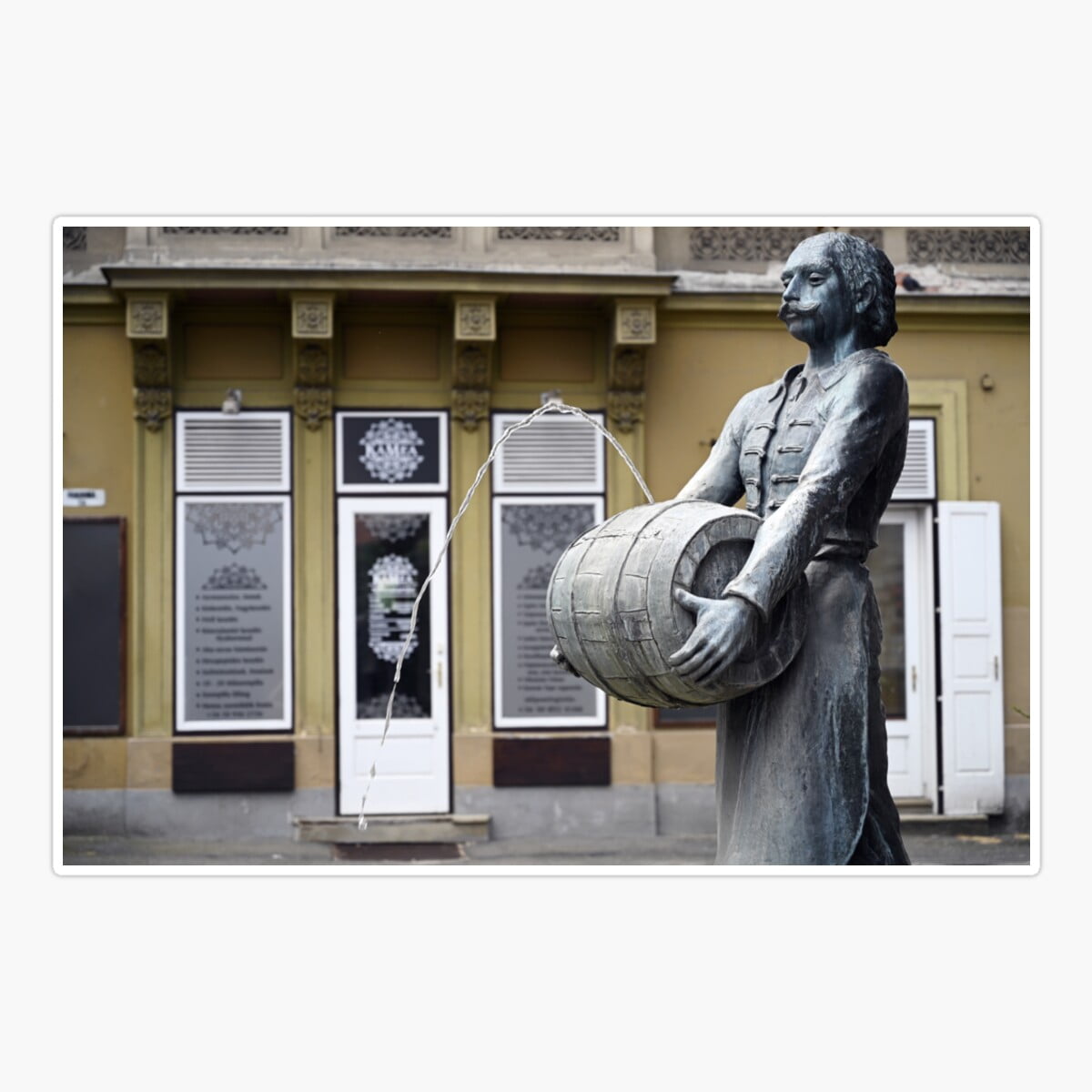DOPASTICKER A Man Holding A Wine Barrel Monument In Sopron Hungary ...
