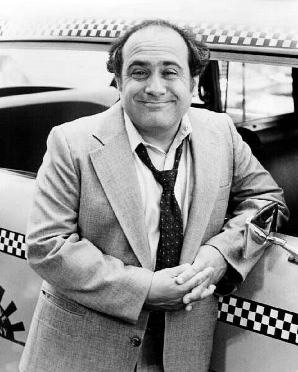 Danny De Vito smiling as Louis De Palma leaning on cab in Taxi 8x10 ...