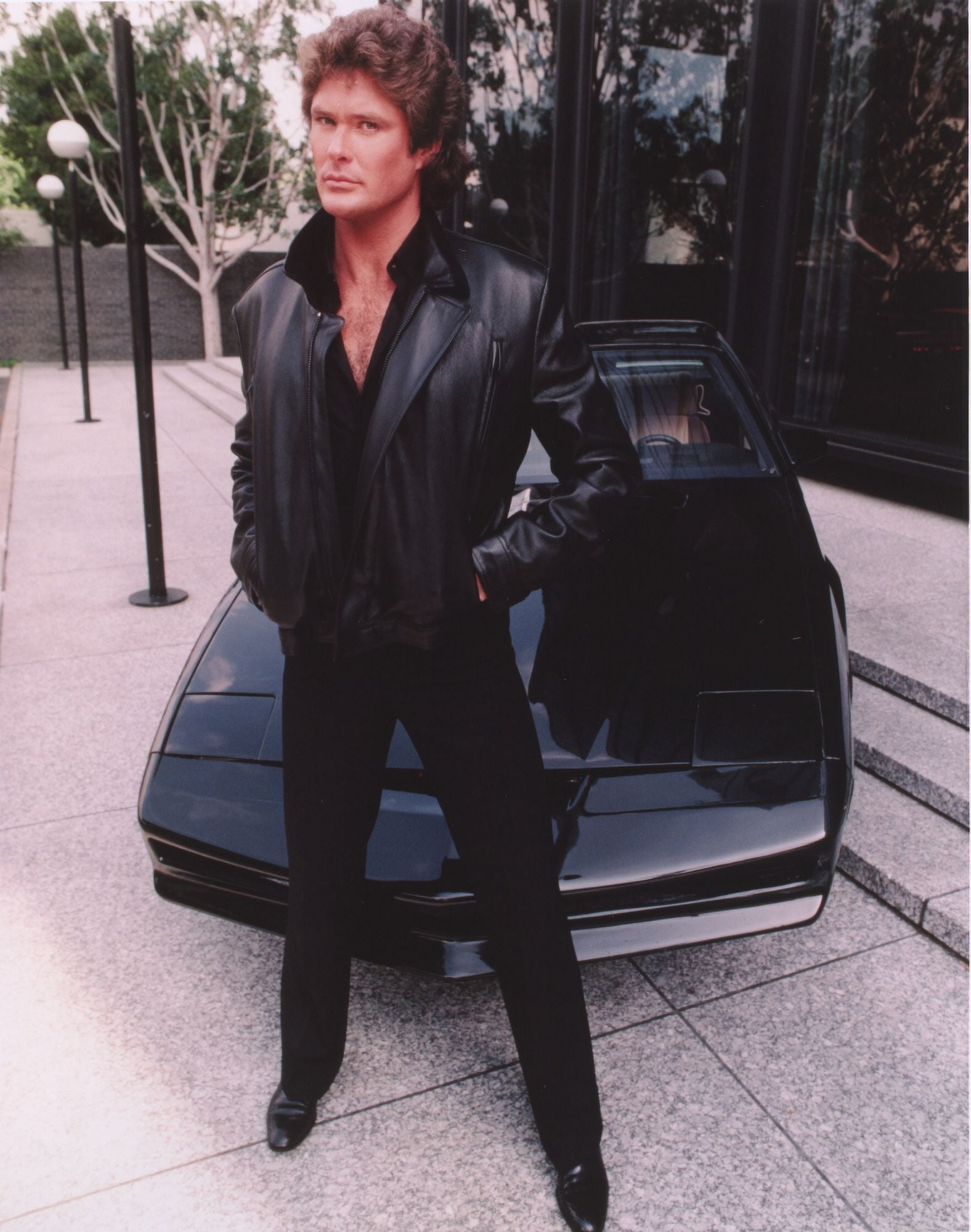 David Hasselhoff standing in Black Leather Jacket with Black Pants and ...