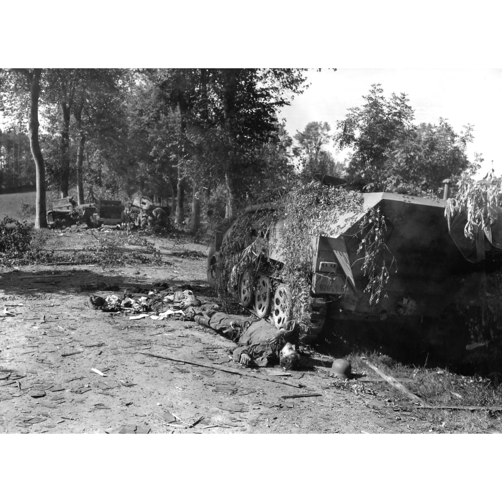 Dead German Soldier Lies Beside A Wrecked Half-Track Near Mortain. This ...