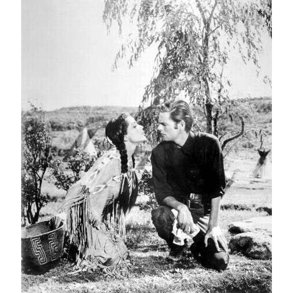 Debra Paget- Holding bucket with braids in hair Photo Print (8 x 10 ...