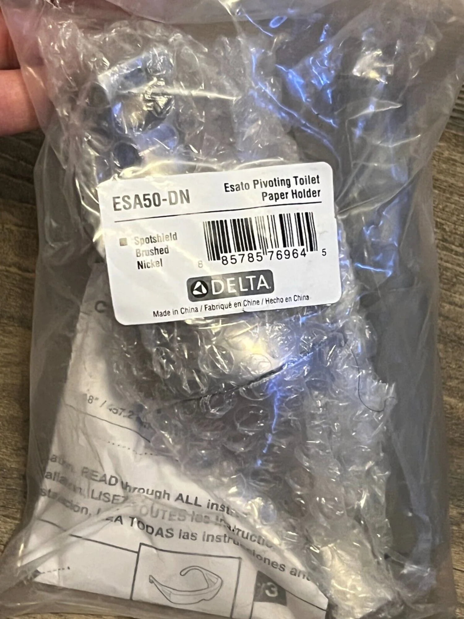 Delta Esato Wall Mount Spring Loaded Toilet Paper Holder in Brushed ...