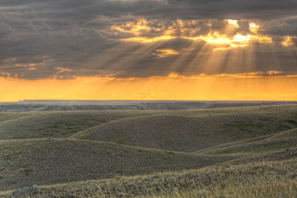 Design Pics DPI2039156 Rays of Sunset Light Between The Clouds ...