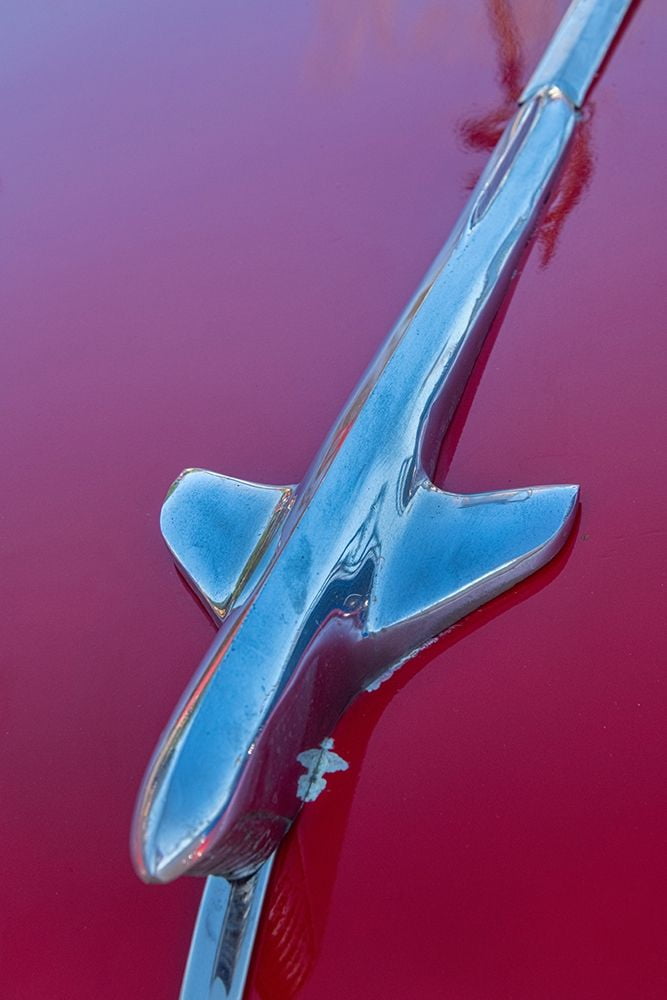 Detail of hood ornament on red classic American car in Habana-Havana ...