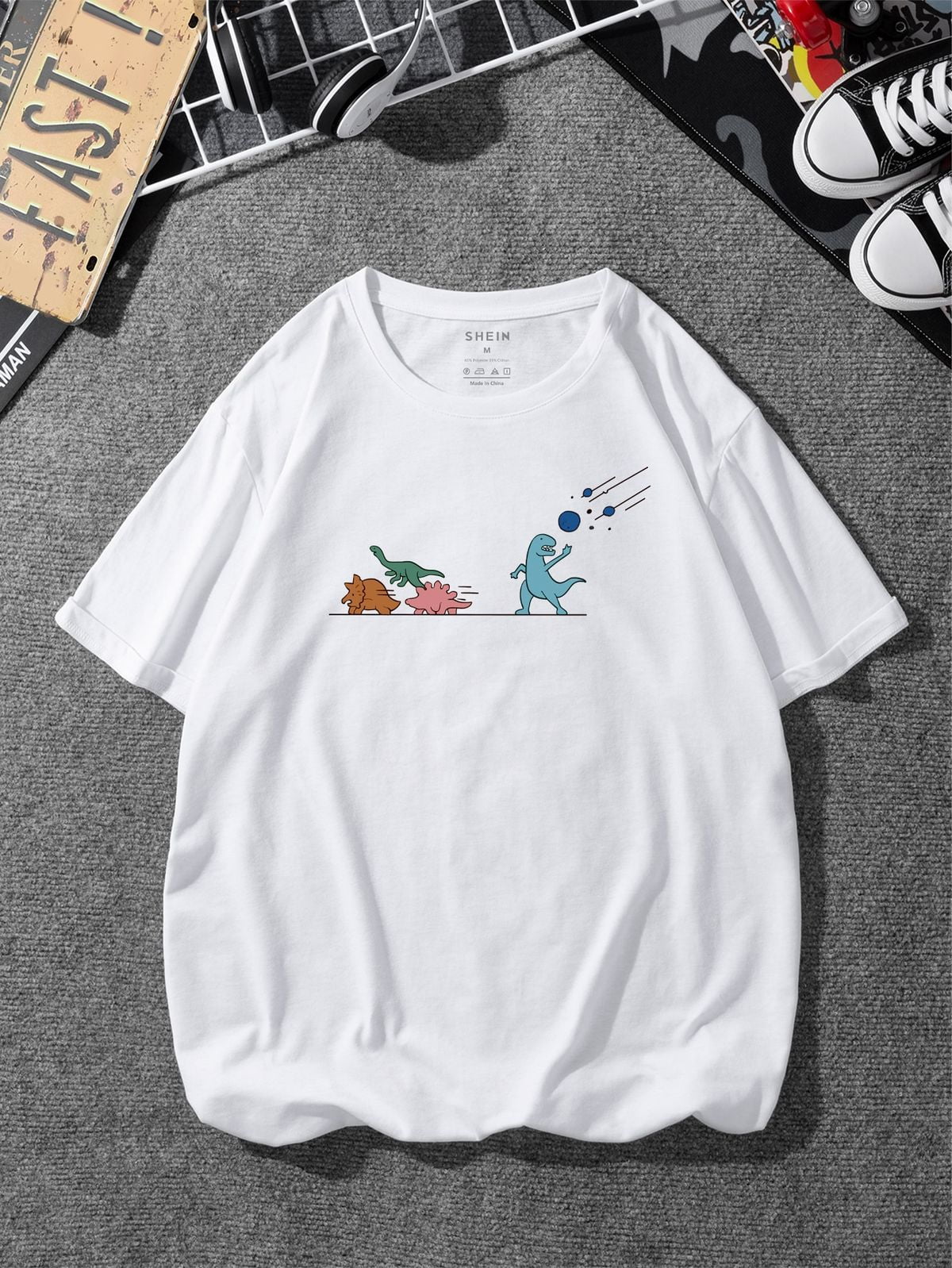 Dinosaur Art Shirt Featuring Playful Dino Characters and Falling Meteor ...