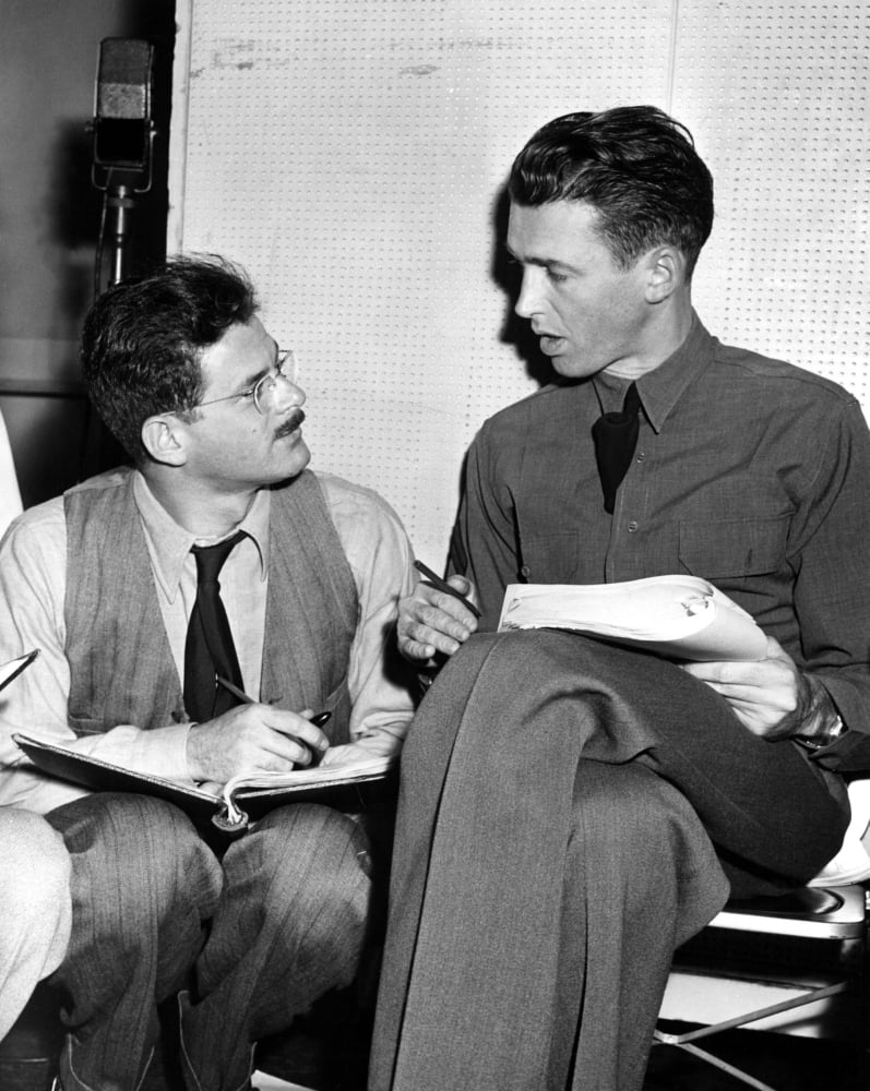 Director Norman Corwin Discusses Script With Lieutenant James Stewart For A This Is War Radio ...