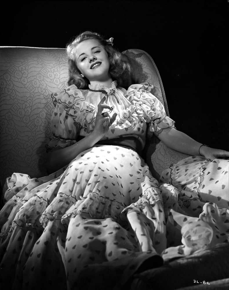 Dona Lee on a Printed Dress sitting and smiling Photo Print (24 x 30 ...