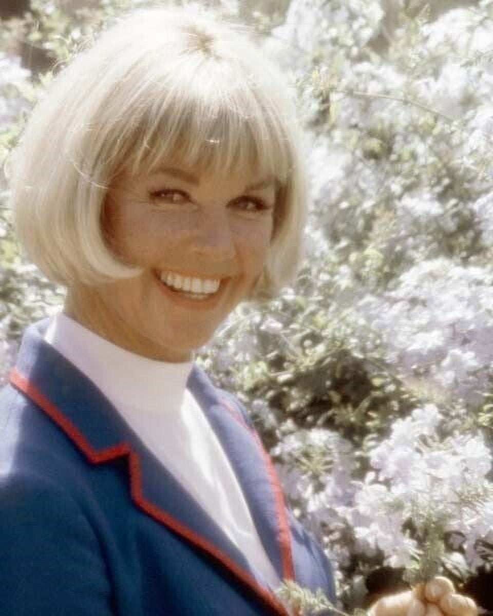 Doris Day with radiant smile posing next to flowering bush 11x17 poster ...