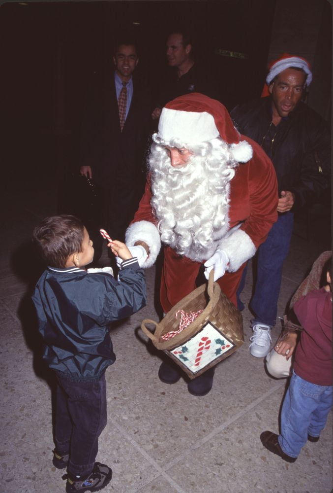 Drake Hogestyn Dressed As Santa Handing Out Candy Canes At "Bright ...