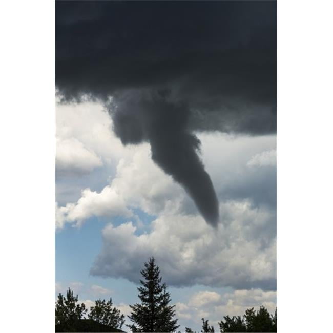 Dramatic Funnel Cloud Created in Dark Storm Clouds with Silhouetted ...