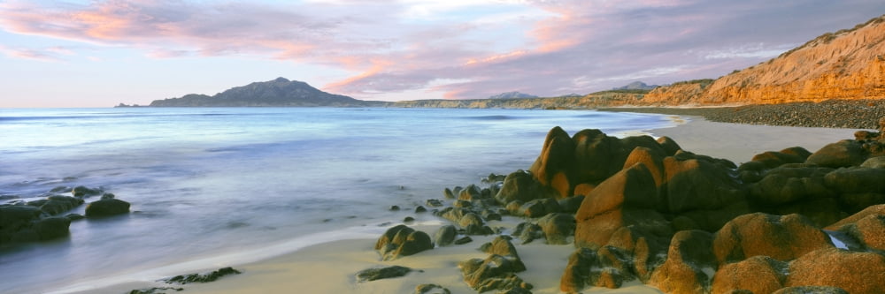 Dramatic sunrise at the shoreline with alpenglow near Cabo Pulmo, Cabo ...