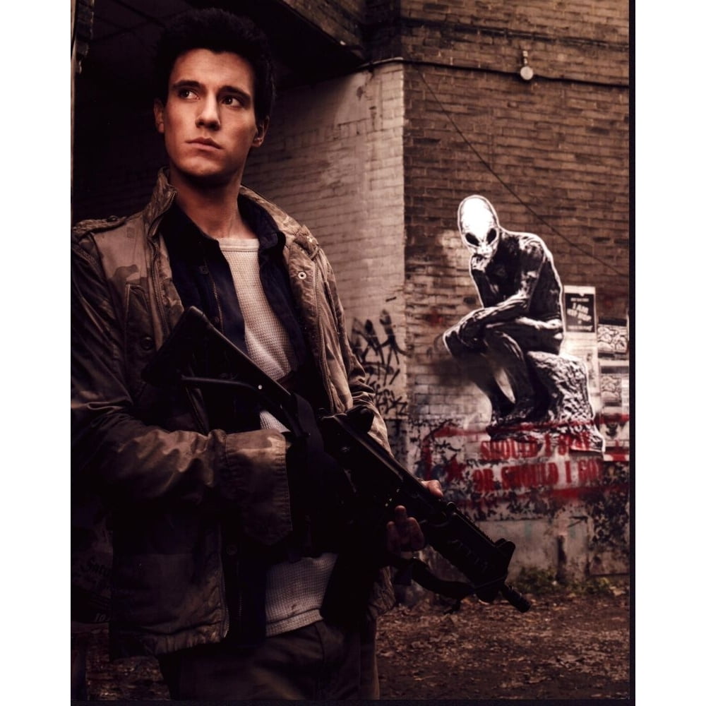 Drew Roy Holding Gun With Alien Graffiti In Falling Skies Photo Print ...