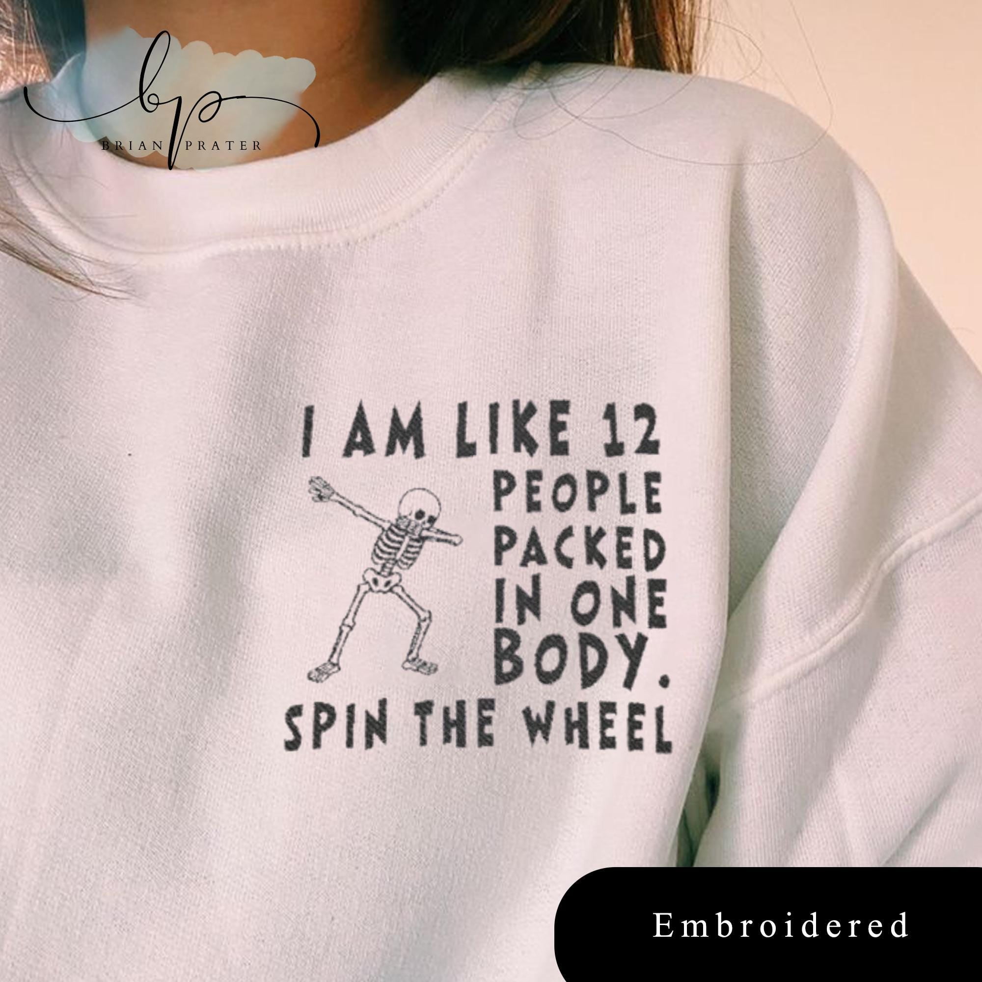 Embroidered I Am Like 12 People Packed In One Body Spin The Wheel Shirt