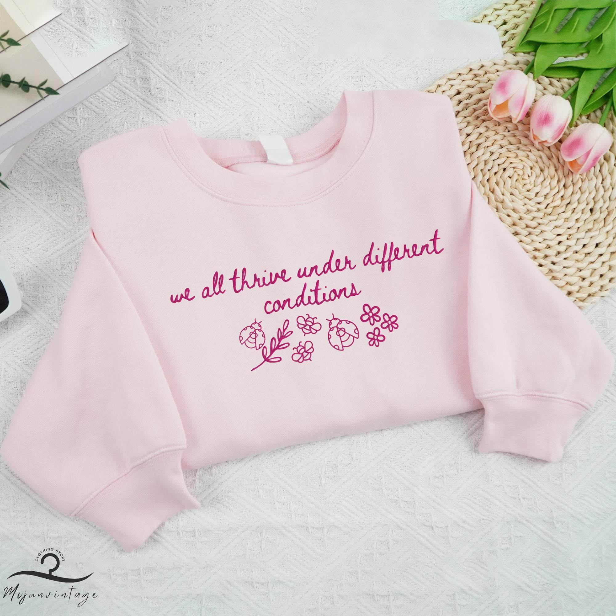 EMBROIDERED We All Thrive Under Different Conditions Sweatshirt ...