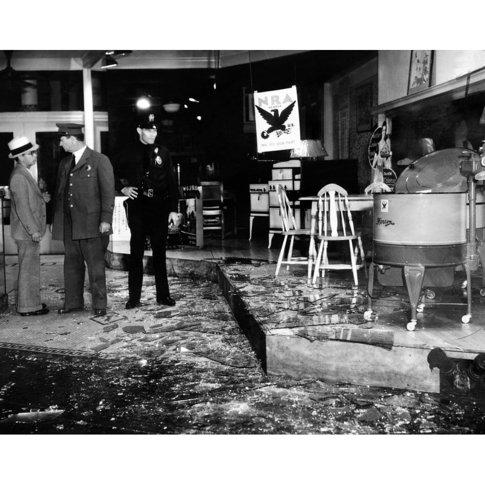 Earthquake Damages A Store In The Heart Of Los Angeles. A Policeman ...