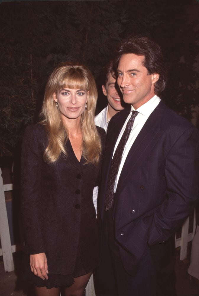 Eileen Davidson In Black Skirt Suit & Drake Hogestyn In Navy Suit At ...