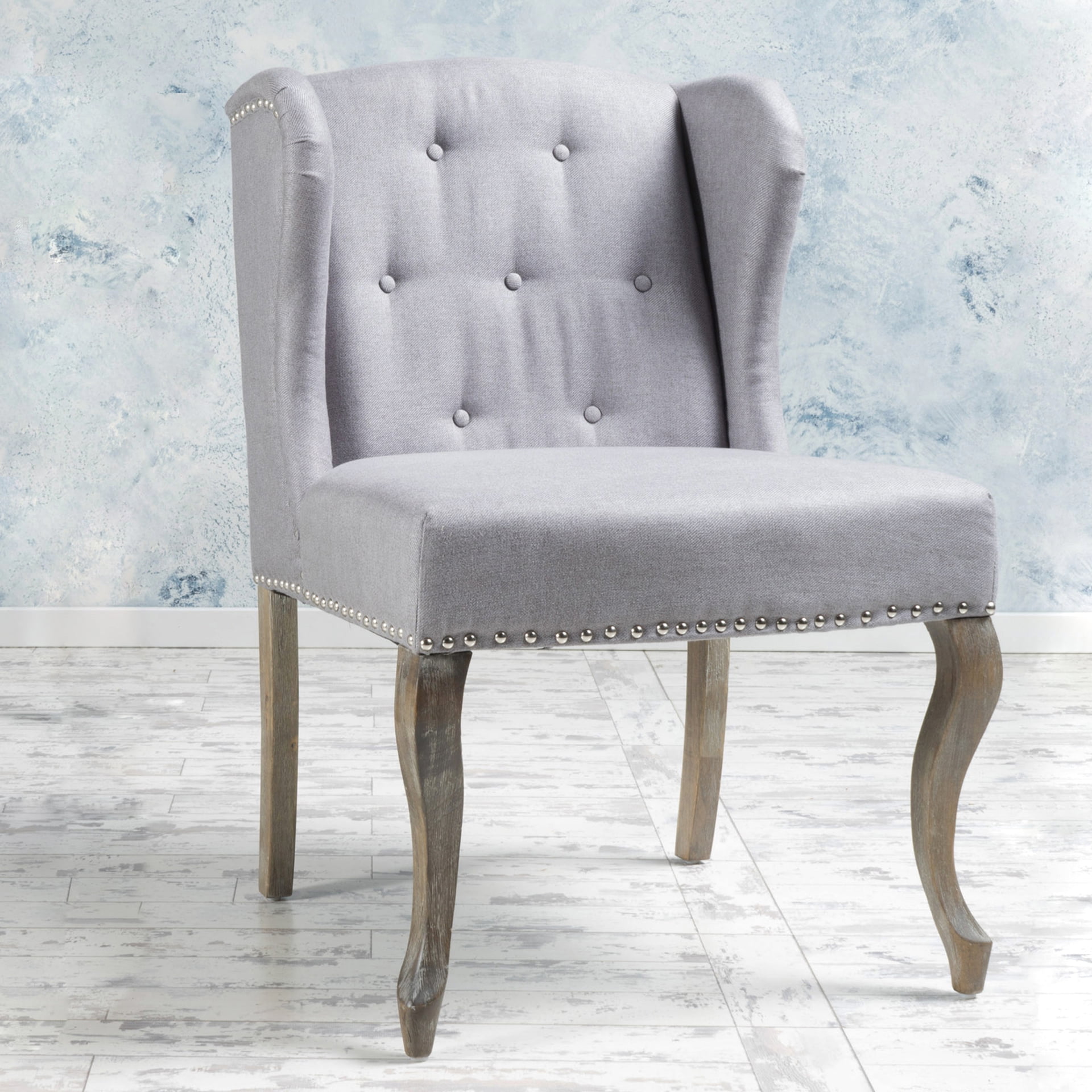 Elegant Wingback Chair In Grey With Stunning Trim Details Stylish ...
