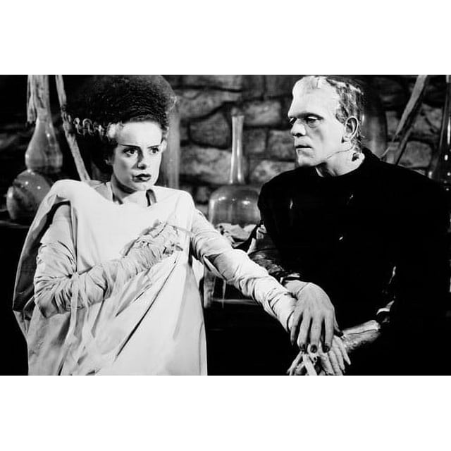 Elsa Lanchester and Boris Karloff in Bride of Frankenstein holding ...