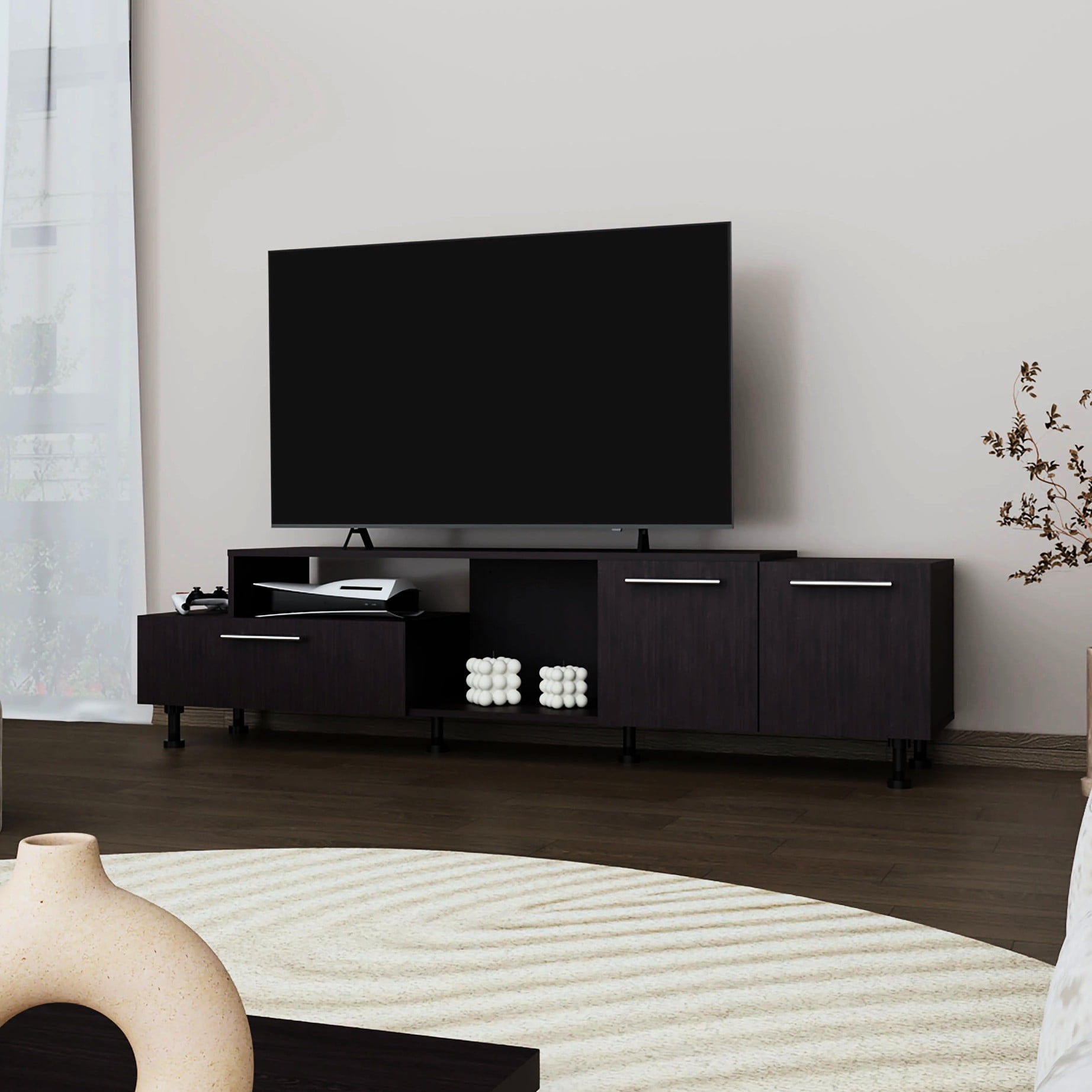 Entertainment center with open storage for easy access in primary ...