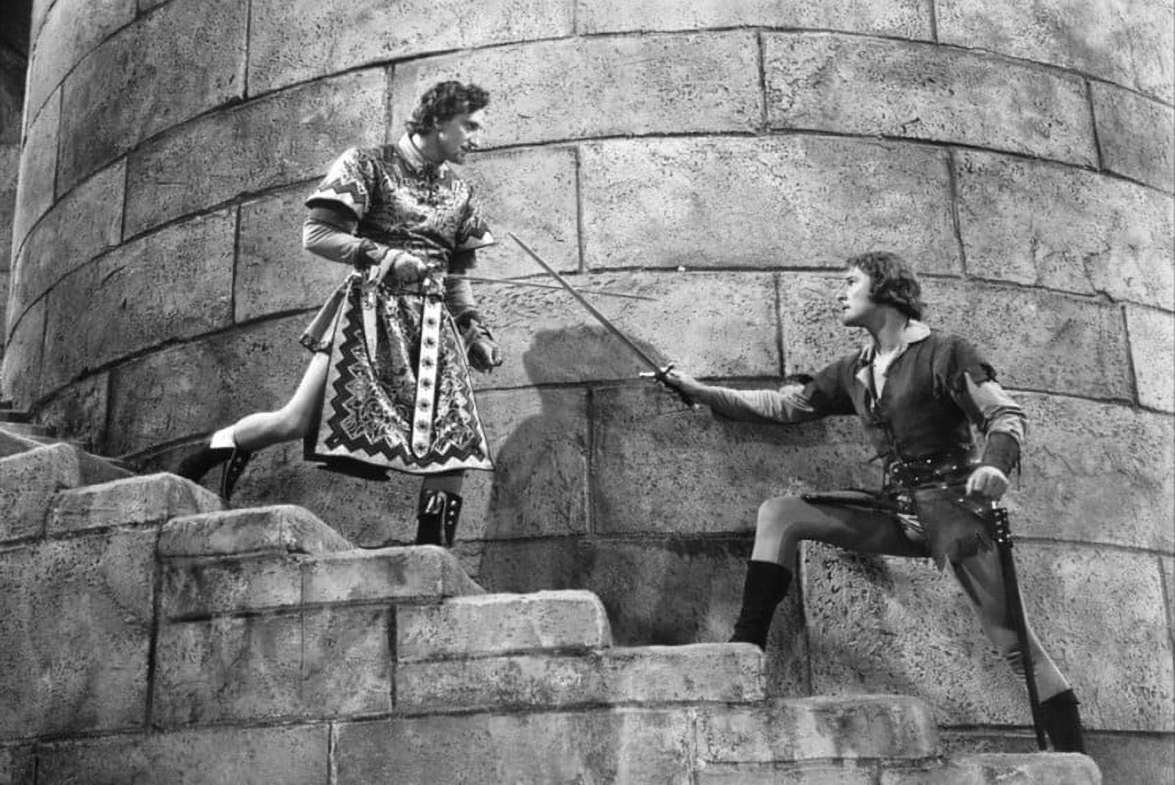 Errol Flynn and Basil Rathbone in The Adventures of Robin Hood sword ...
