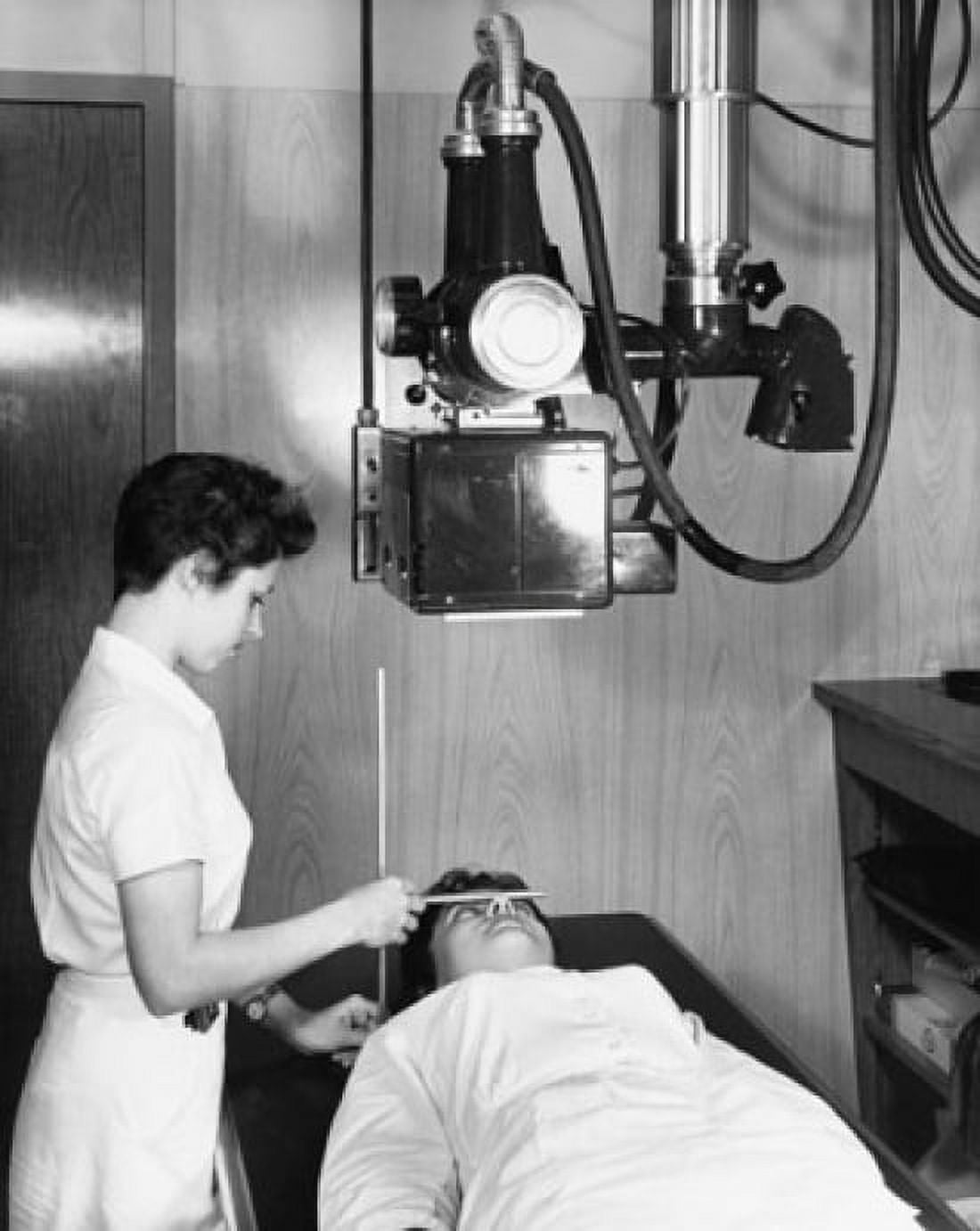Female Radiologist Taking An X Ray Of A Patient Canvas Art 24 X 36