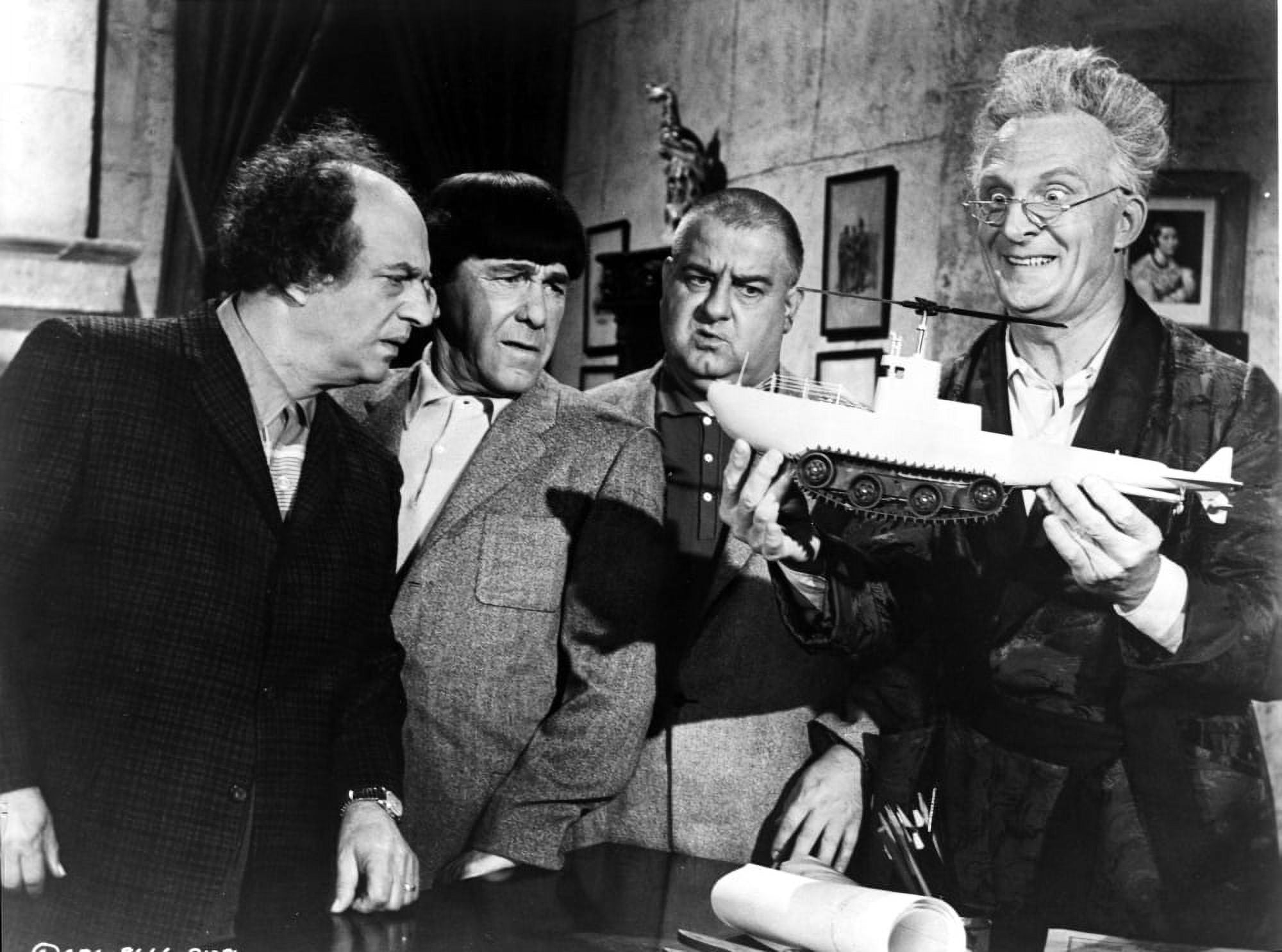 Film still of Emil Stika carrying a model ship and co stars Photo Print ...